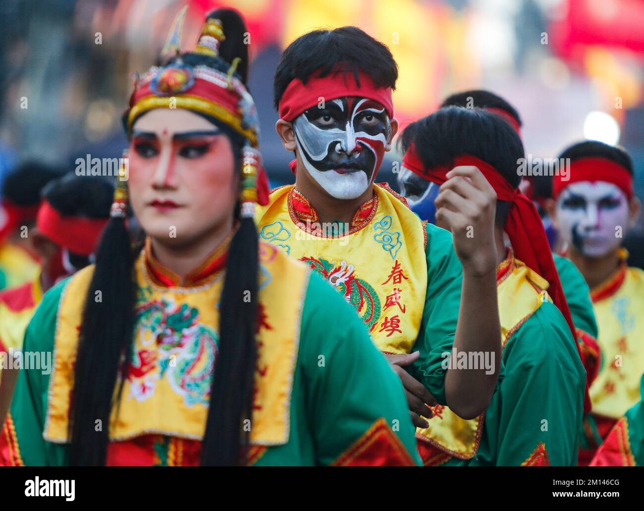Performers in costumes and painted faces perform in 108 the great dance ...