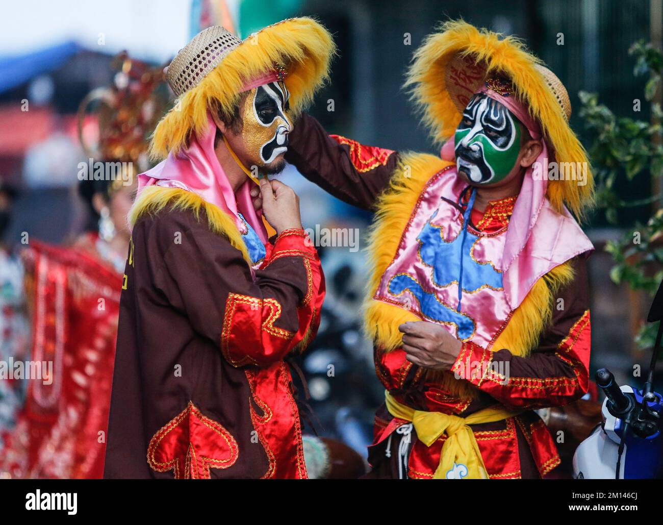 Performers in costumes and painted faces perform in 108 the great dance ...