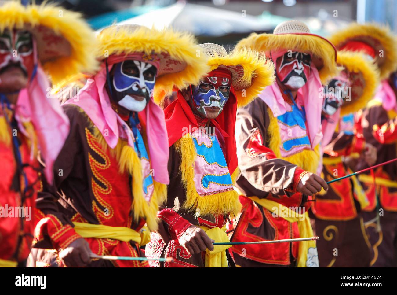 Performers in costumes and painted faces perform in 108 the great dance ...