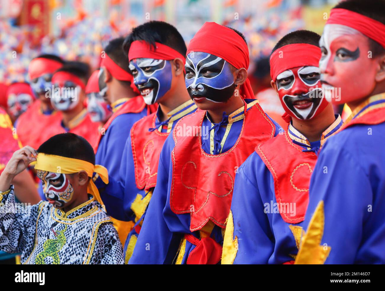 Performers in costumes and painted faces perform in 108 the great dance ...