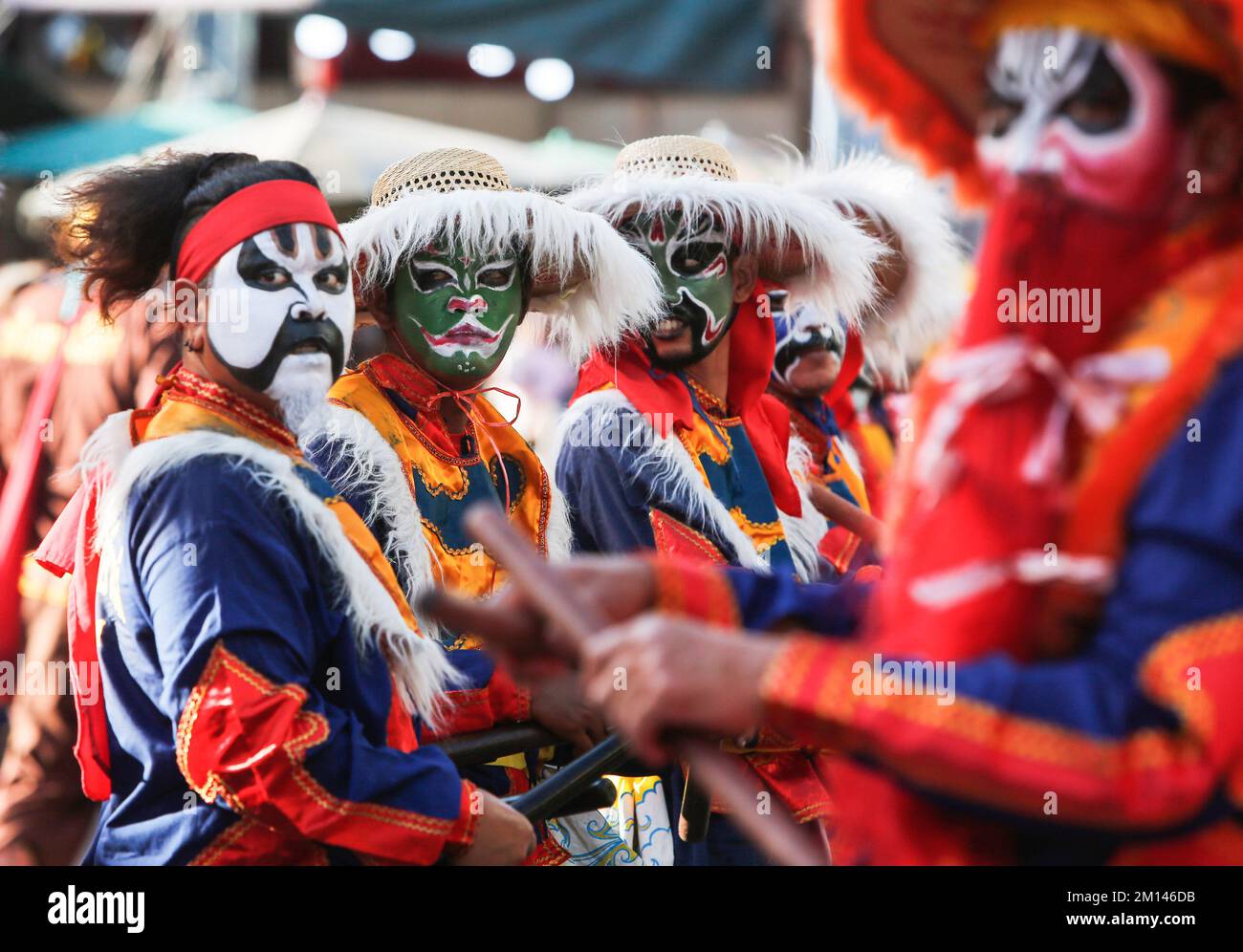 Performers in costumes and painted faces perform in 108 the great dance ...