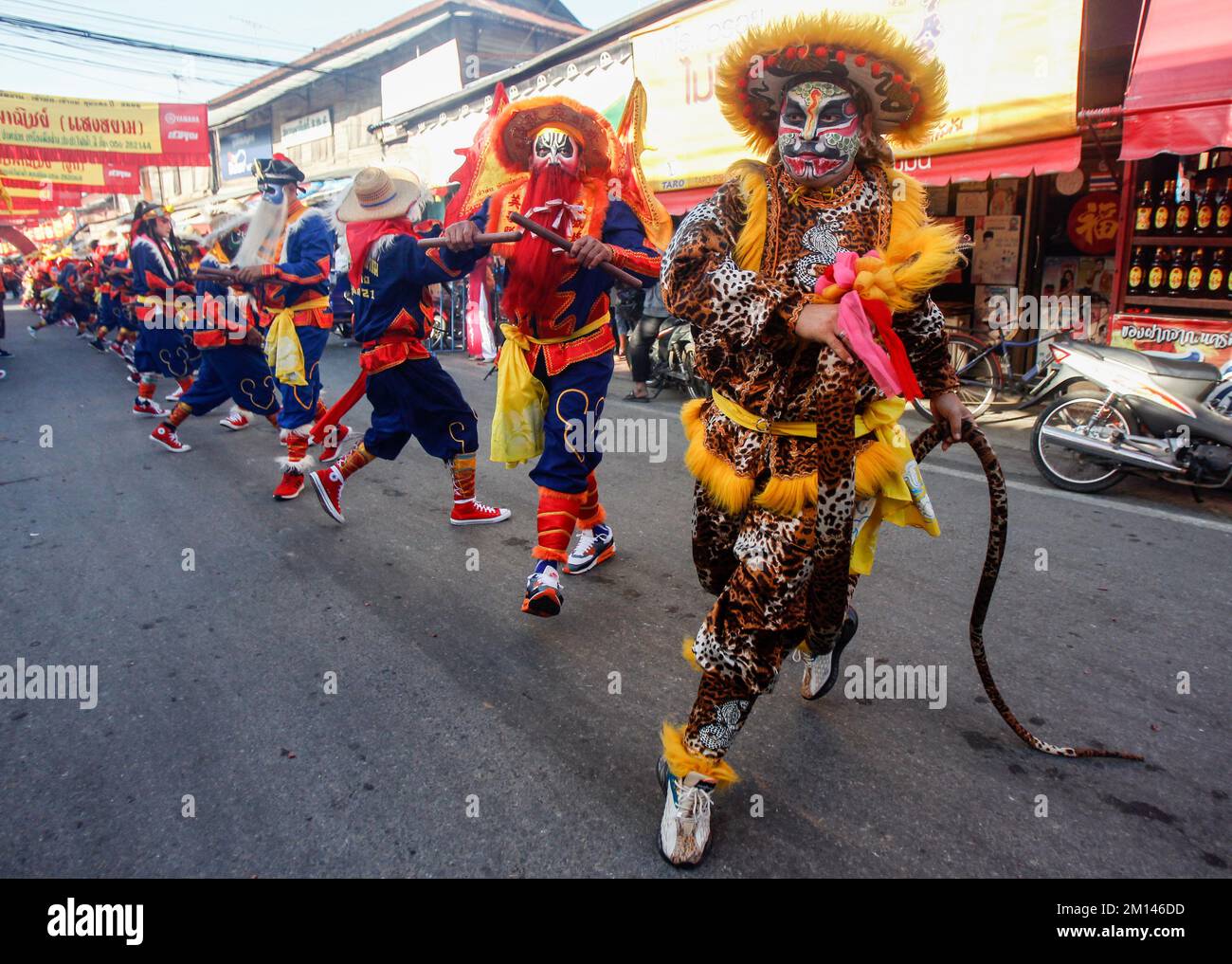 Performers in costumes and painted faces perform in 108 the great dance ...