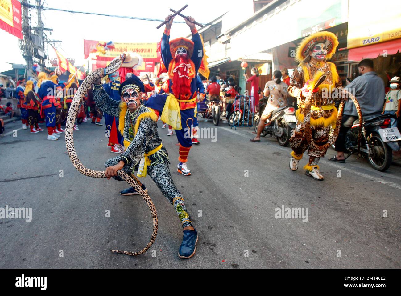 Performers in costumes and painted faces perform in 108 the great dance ...