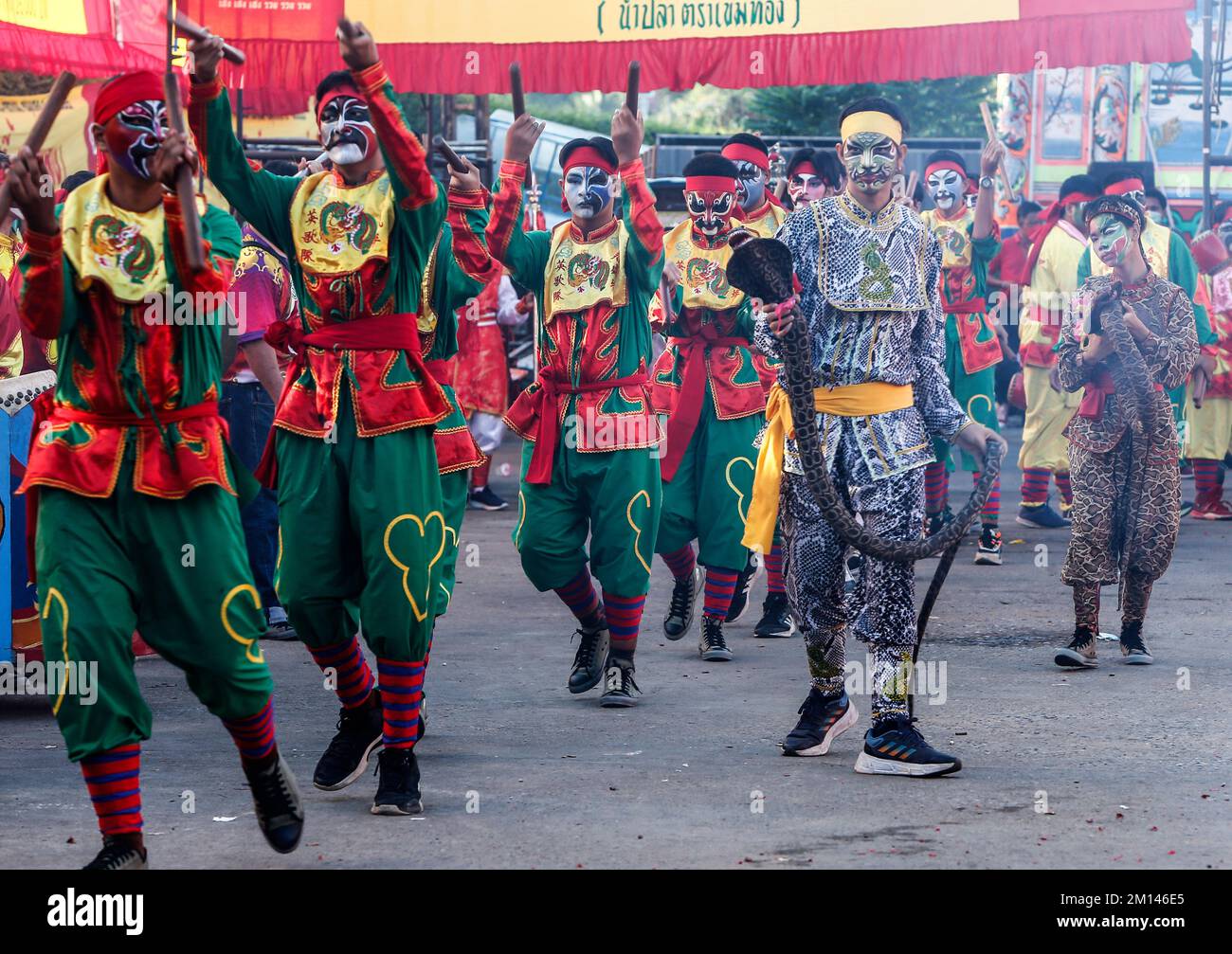 Performers in costumes and painted faces perform in 108 the great dance ...