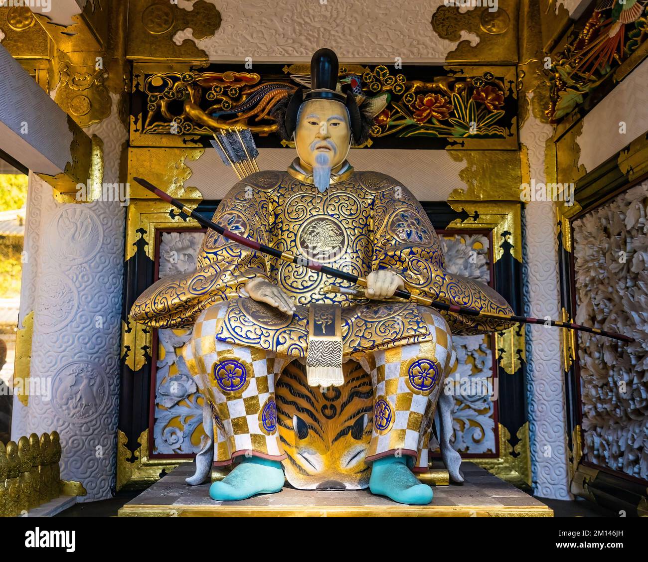 Statue of Shogun Ieyasu at Toshogu Shrine at Nikko sitting with bow ...