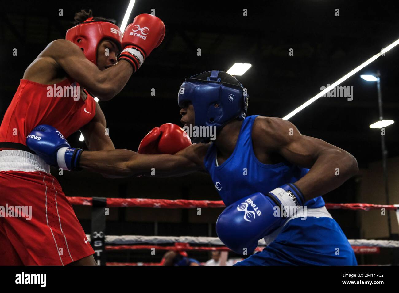 Lubbock, TX, USA. 9th Dec, 2022. Action between Amir Anderson (red) of ...