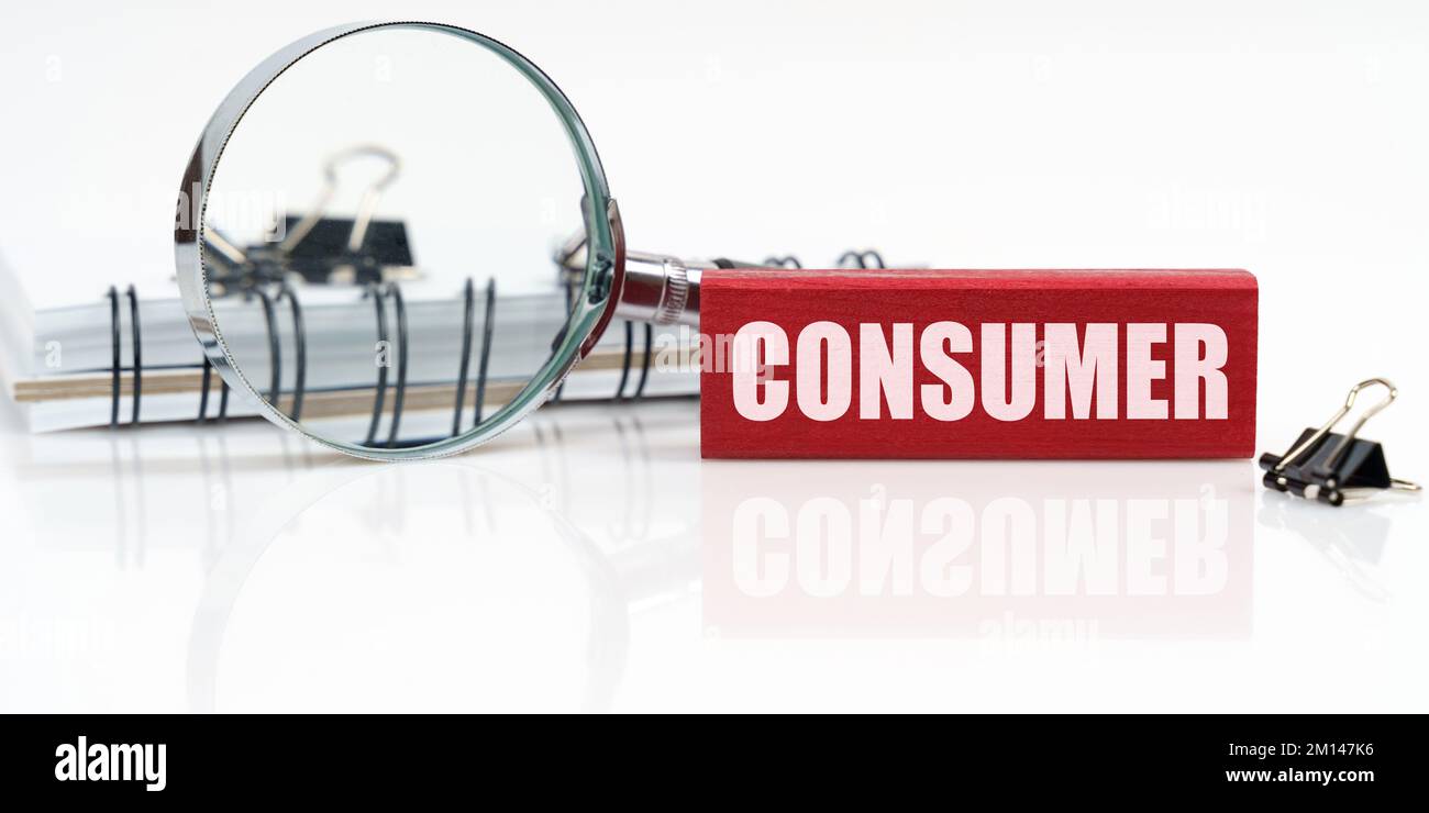 Business concept. On the table is a notebook, a magnifying glass and a ...