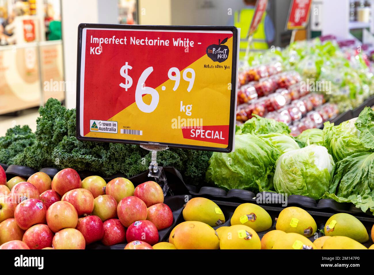 Imperfect white nectarine fruits at Harris Farm supermarket in Sydney ...