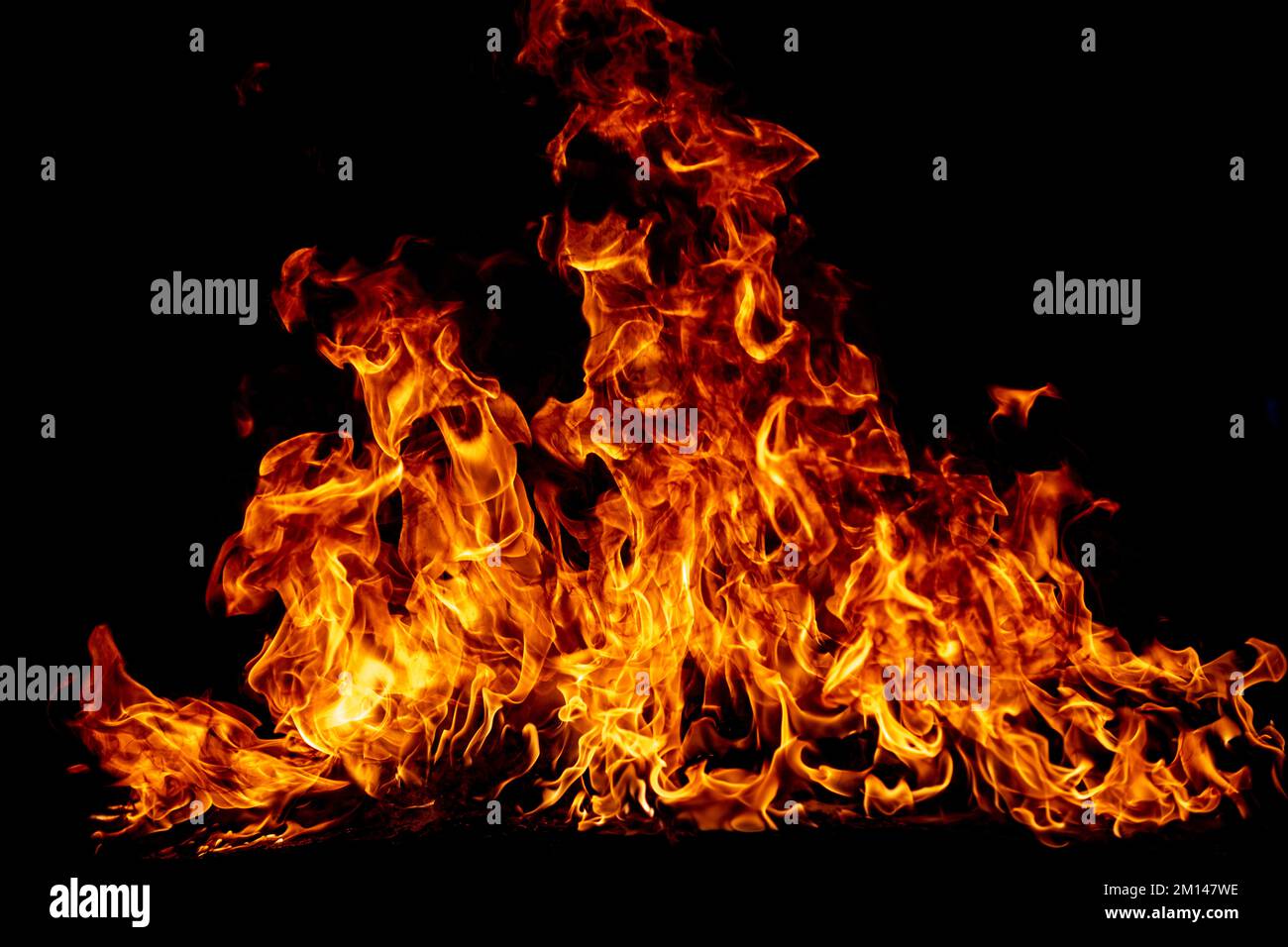 Flame fires. Burn lights on a black background. Fire flames on black ...