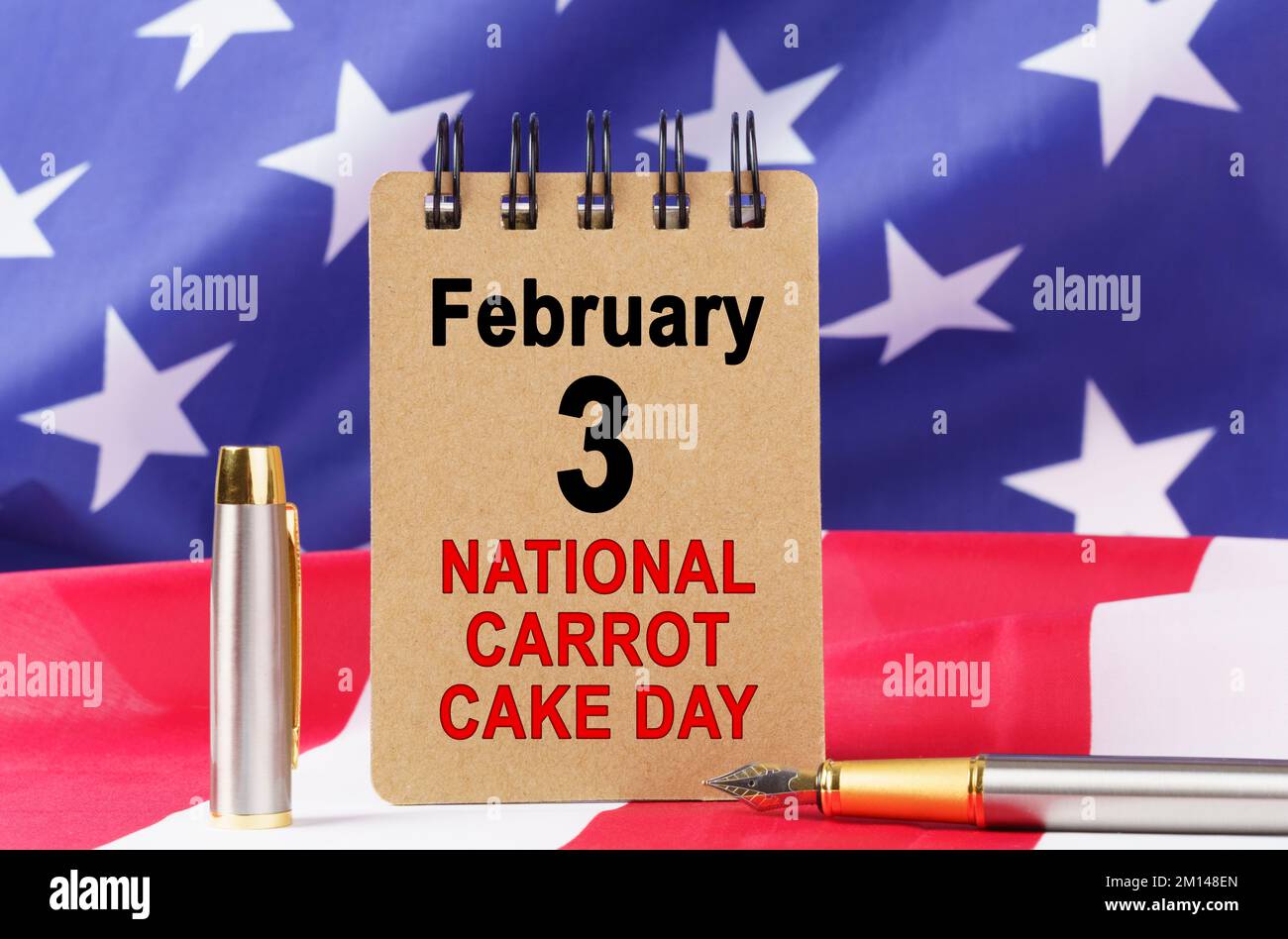 USA Holidays. Against the background of the US flag lies cardboard with ...