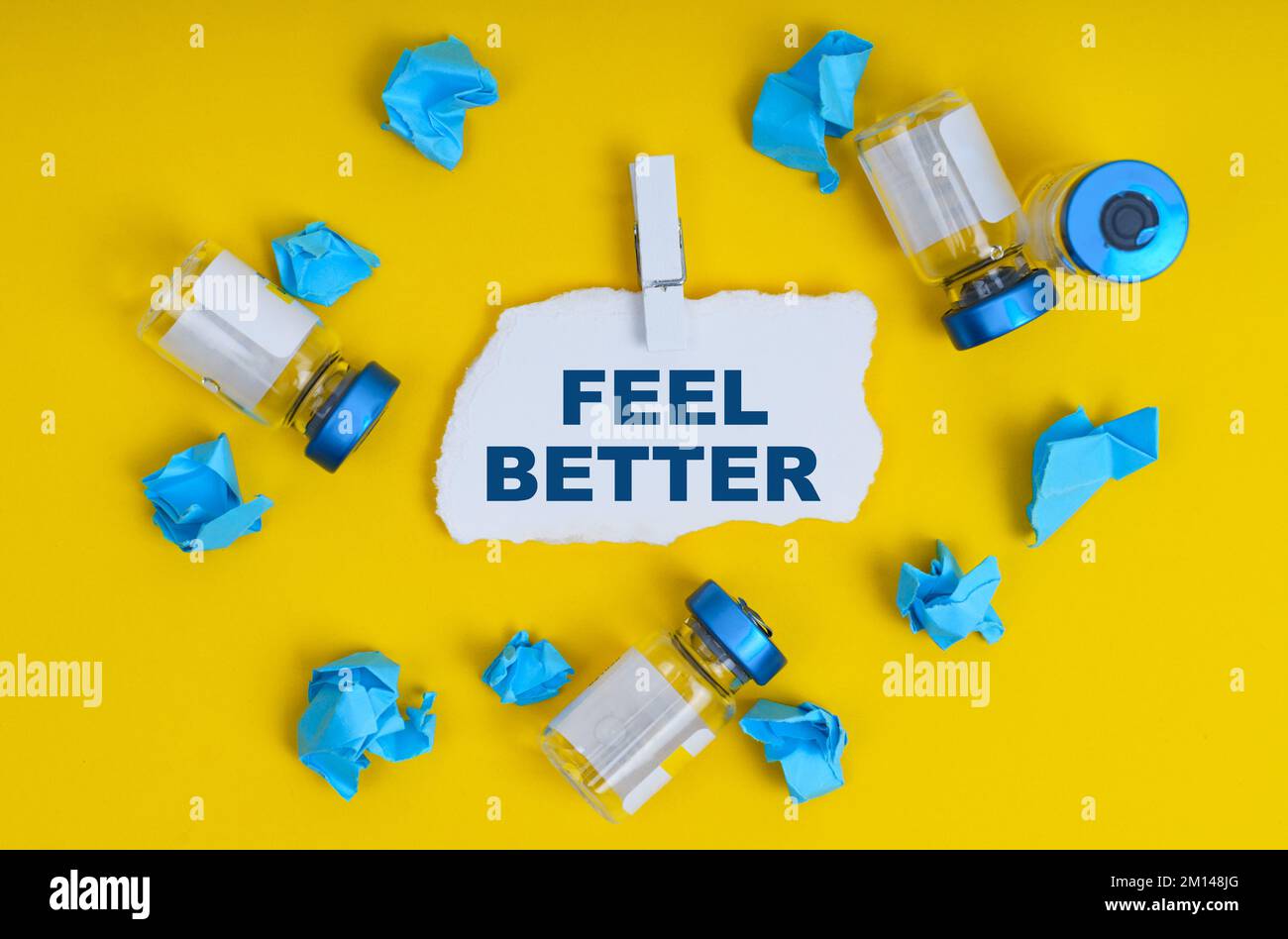 Medicine and health concept. On a yellow background are ampoules, blue ...