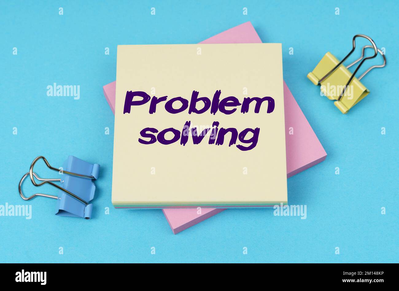 Business and finance concept. On the table are paper clips, note paper ...