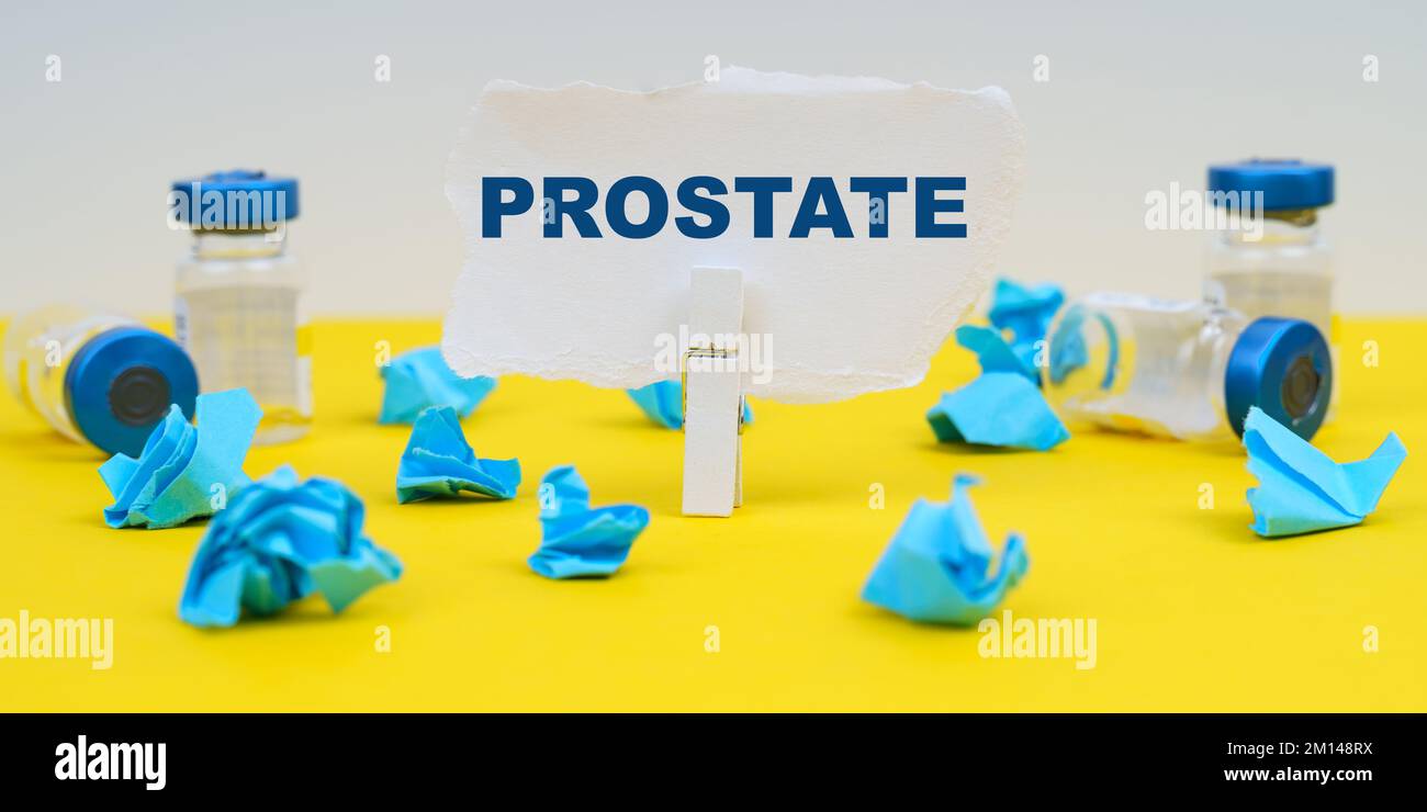 Medicine and health concept. On a yellow background are ampoules, blue ...