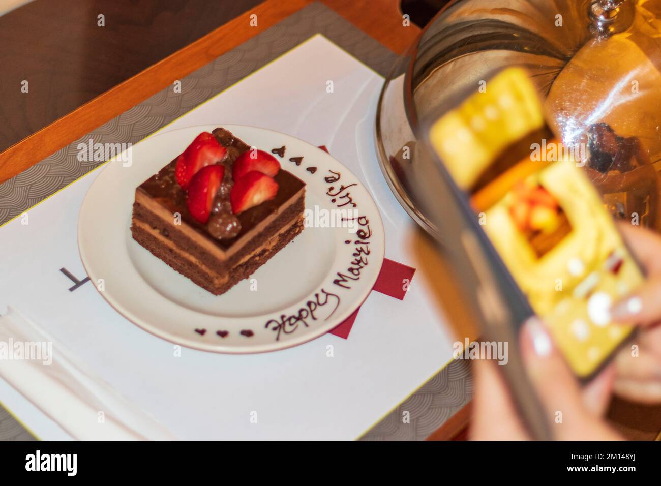 Shot of a chocolate cake for just married Stock Photo - Alamy