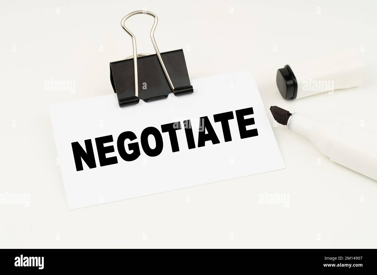 Finance and business concept. On a white background is a marker and a ...