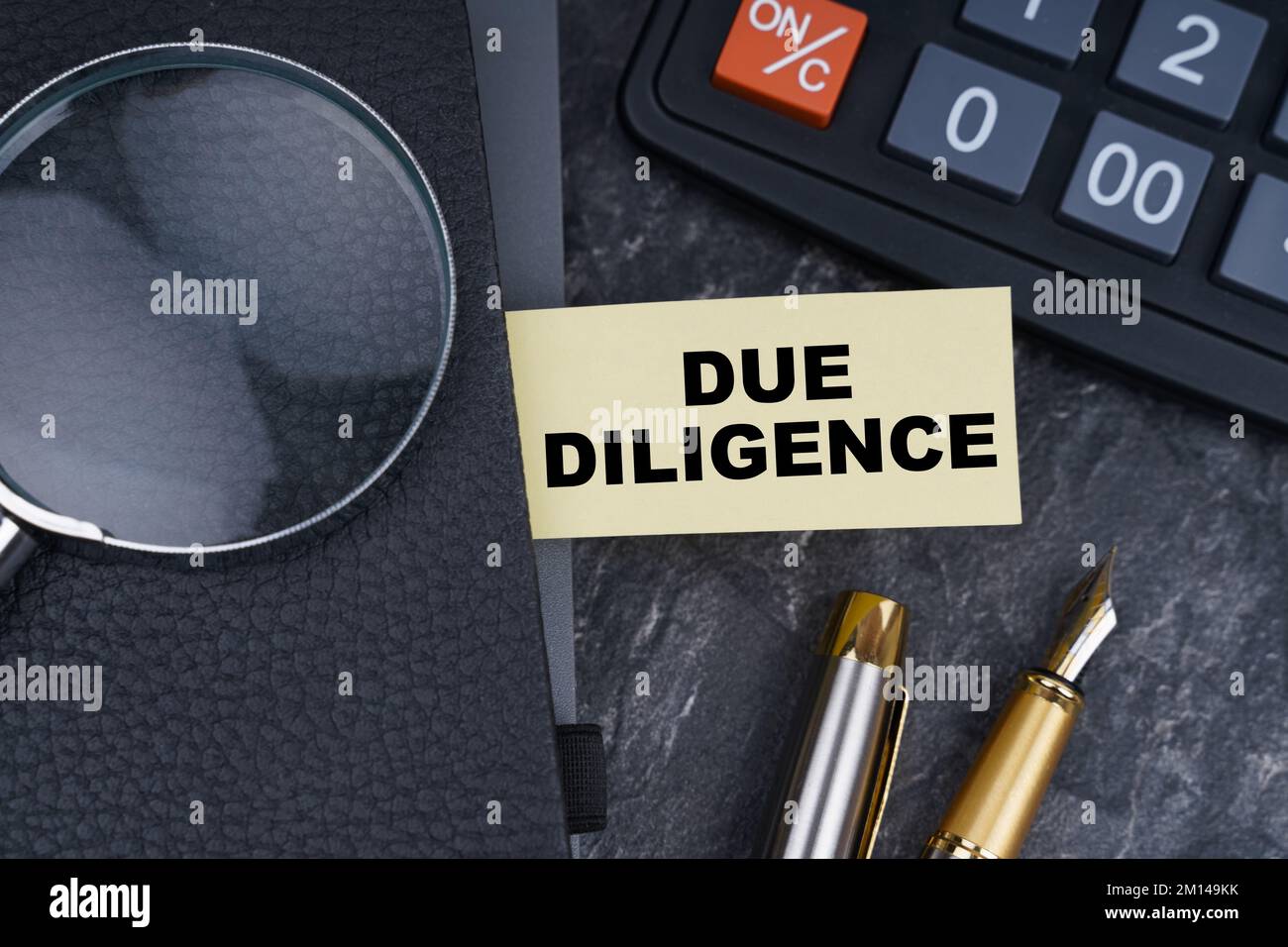 Finance and business concept. On the table is a calculator, a pen, a ...