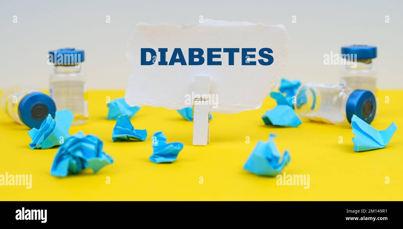 Medicine and health concept. On a yellow background are ampoules, blue ...