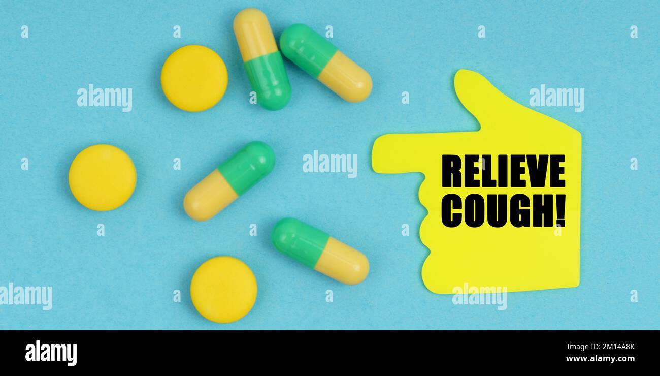 Medicine and health concept. On a blue background, there are pills and ...