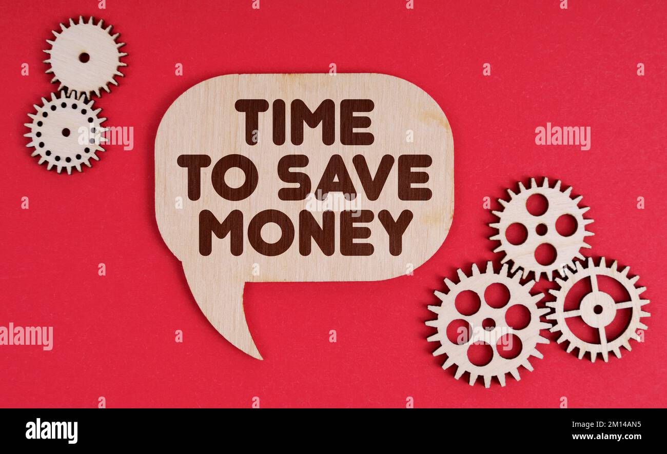 Business and finance concept. On a red background, gears and a thought ...