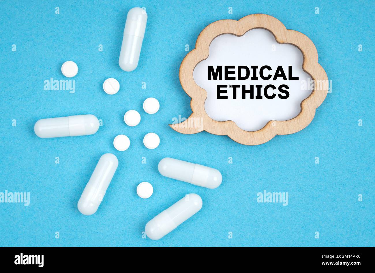 Medicine and health concept. On a blue background, pills and a plate ...