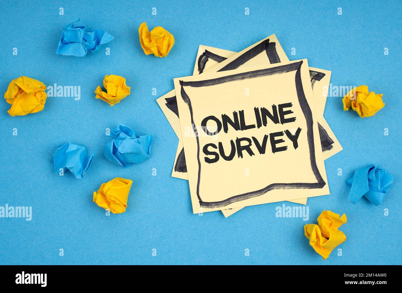 Business concept. On a blue background, there are pieces of paper and a ...