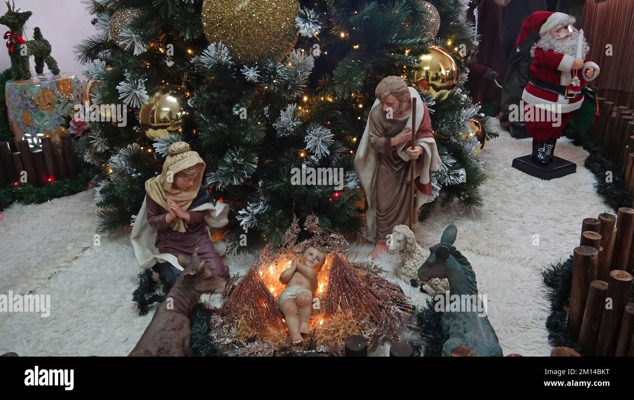 A nativity scene representing the birth of Jesus decorates a Christmas ...