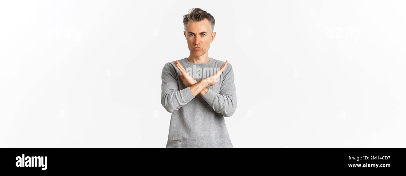 Man cross gesture no white angry hi-res stock photography and images ...