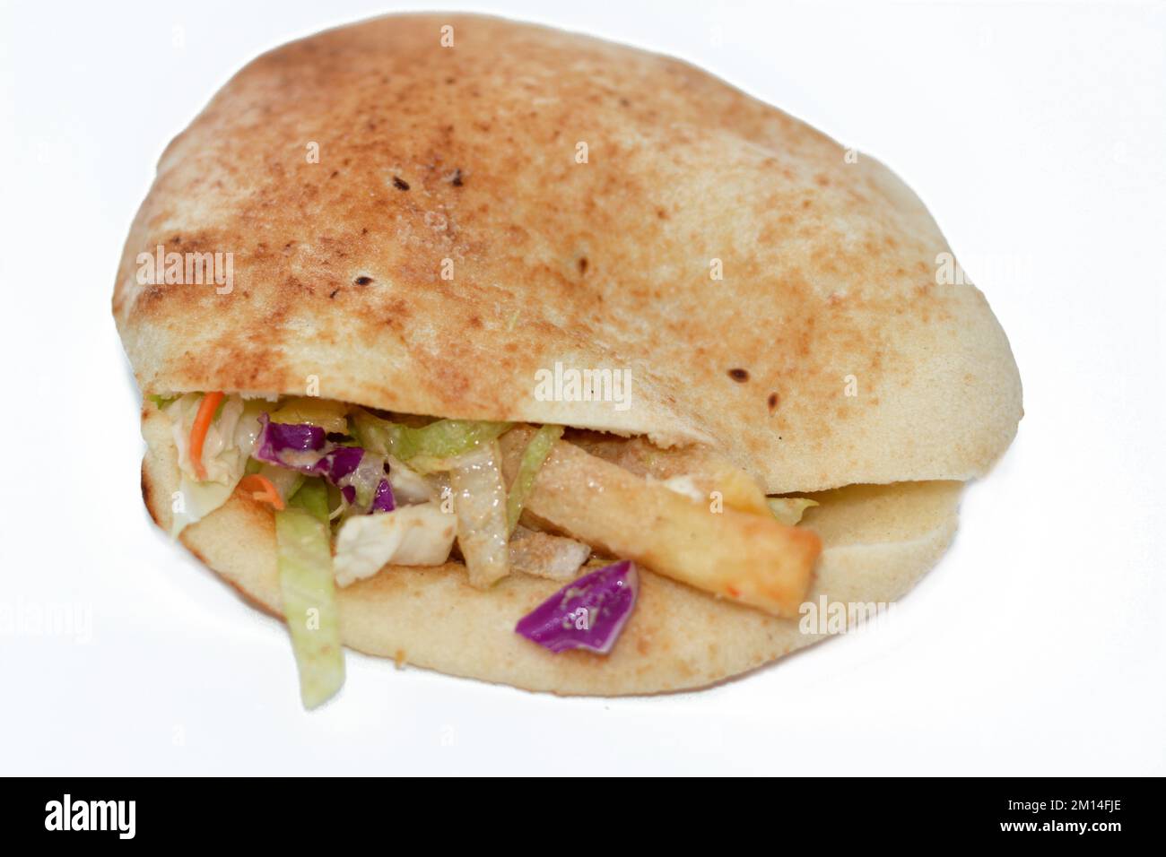 Flat Shami Syrian bread filled with french fries and green salad ...