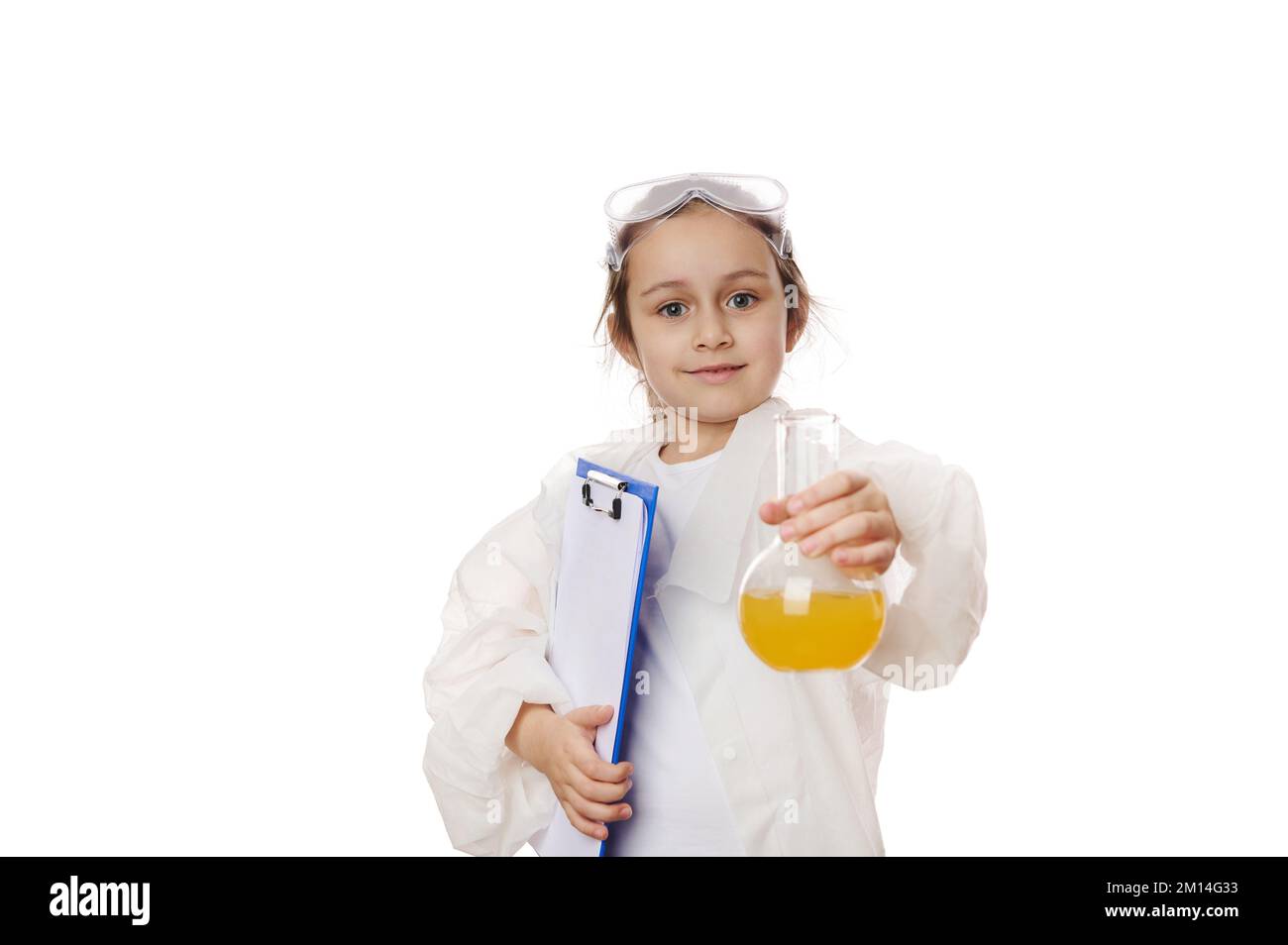Lovely girl, future chemist scientist in lab coat, smiles at camera ...