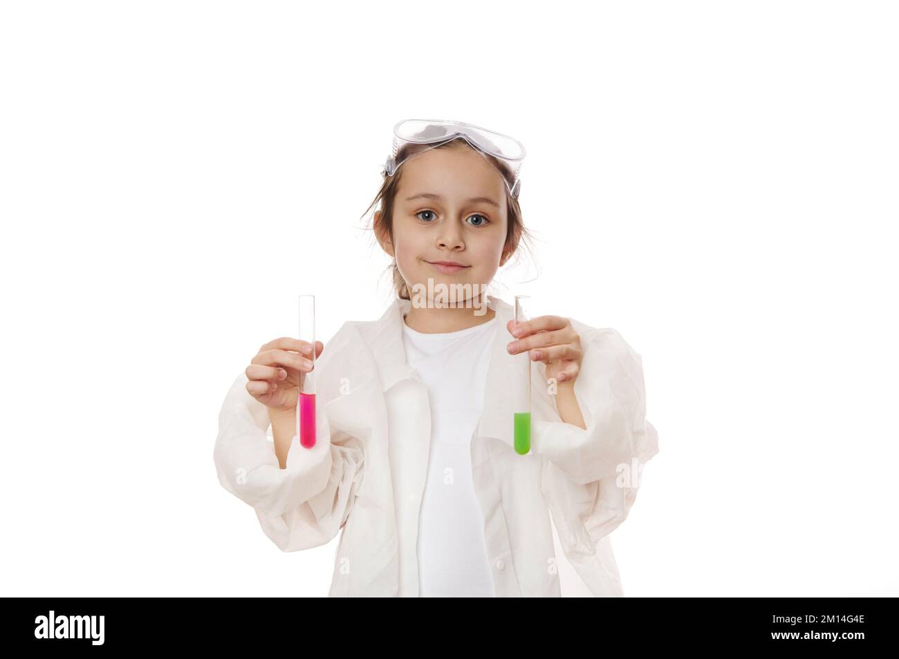 Lovely child girl, future chemist scientist in lab coat, smiles looking ...
