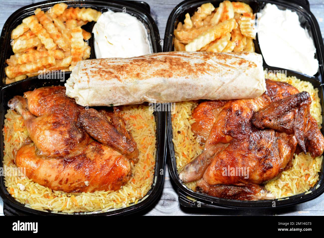 Arabic Syrian cuisine of machine grilled barbecued chicken with ...