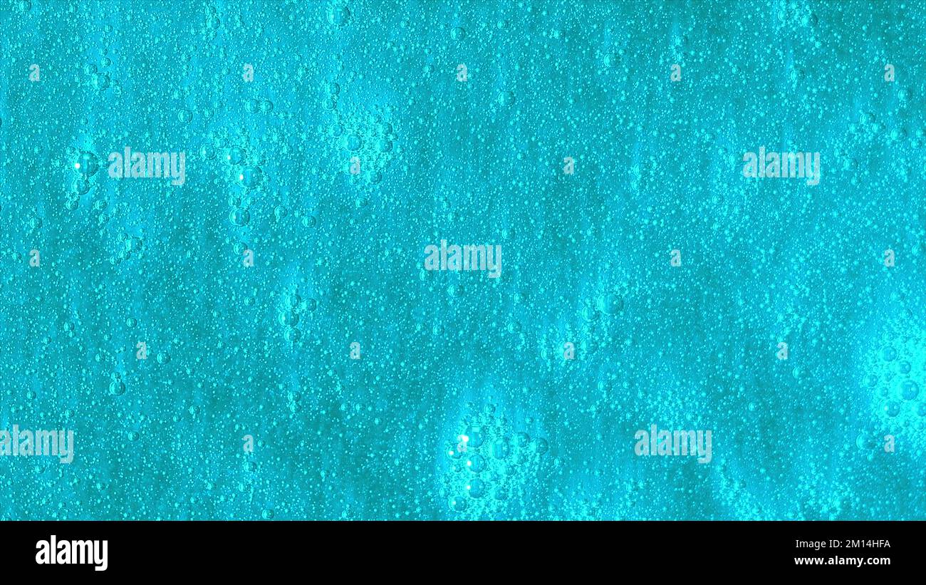 Bright turquoise background with bubbles moving slowly. Beautiful blue ...