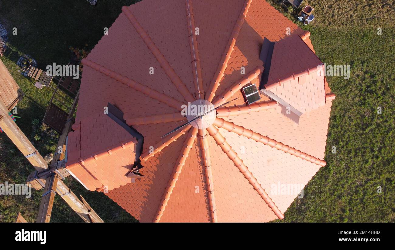 An aerial shot of a roof of a windmill during reconstruction in Czech ...