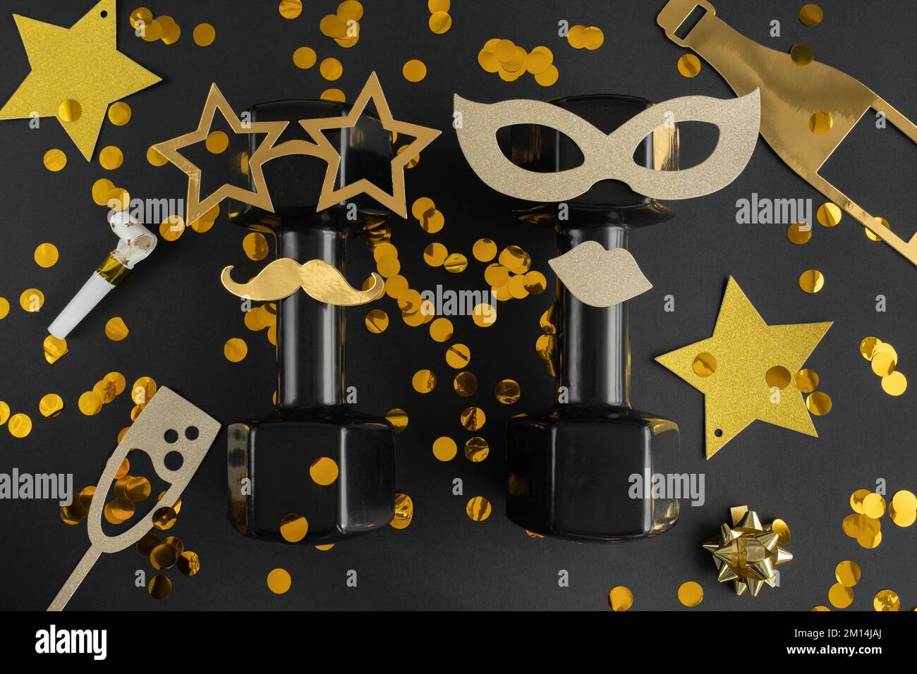Two dumbbells dressed up for New Year's Eve celebration, birthday party ...
