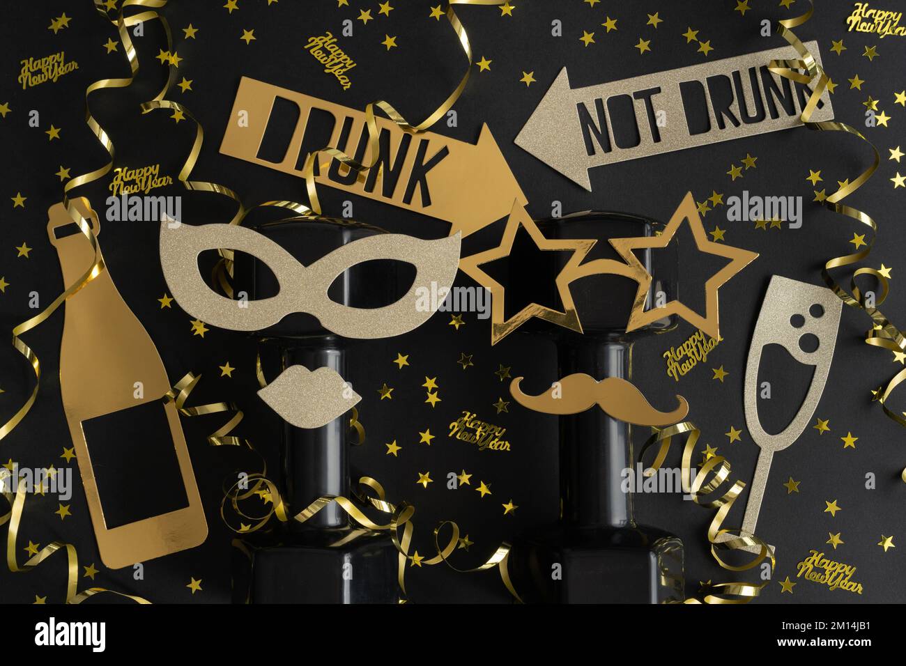 Two dumbbells dressed up for New Year's Eve celebration party or ...