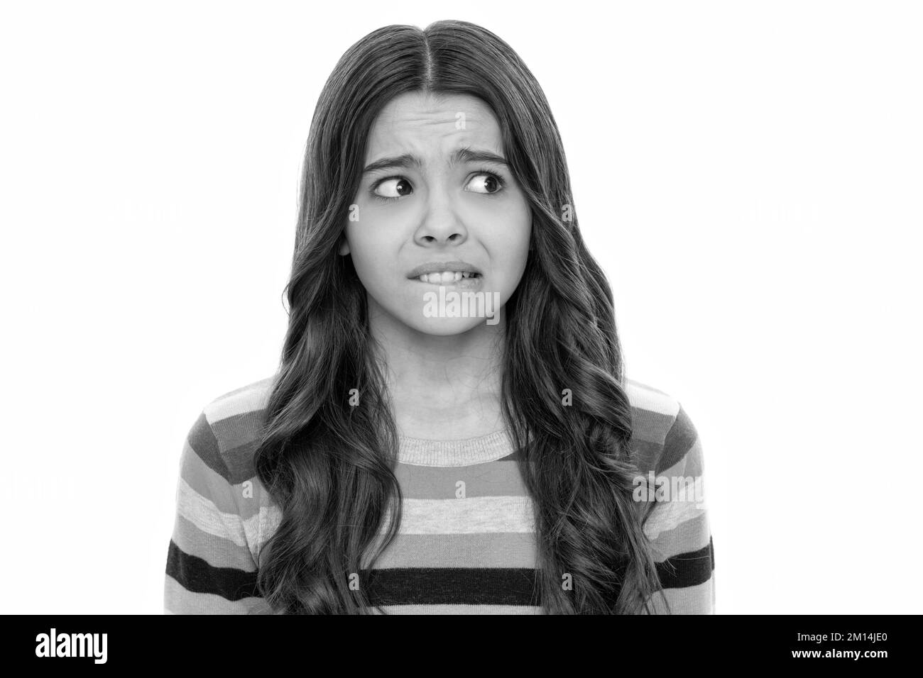 Feeling anxious. Nervous girl portrait isolated on white. Child face ...