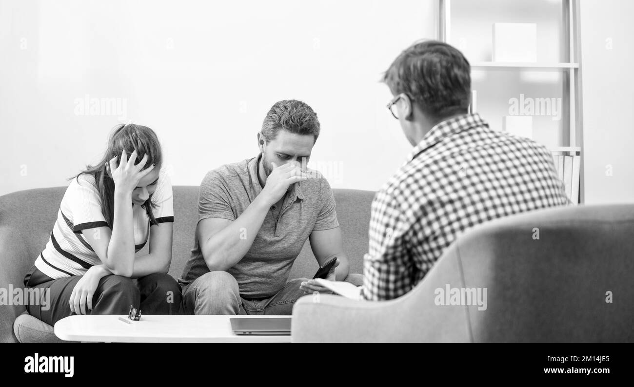 sad couple at psychologist session. family therapy. man and woman talk ...