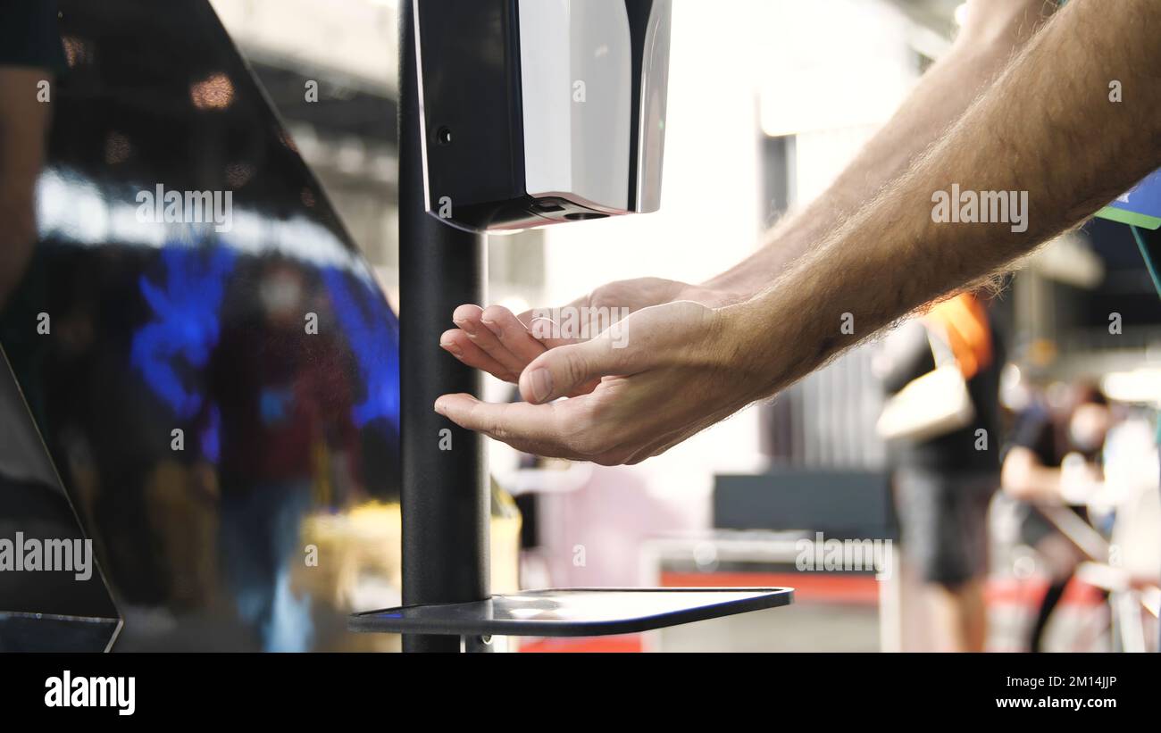 Close up hand sprayed contactless hi-res stock photography and images ...