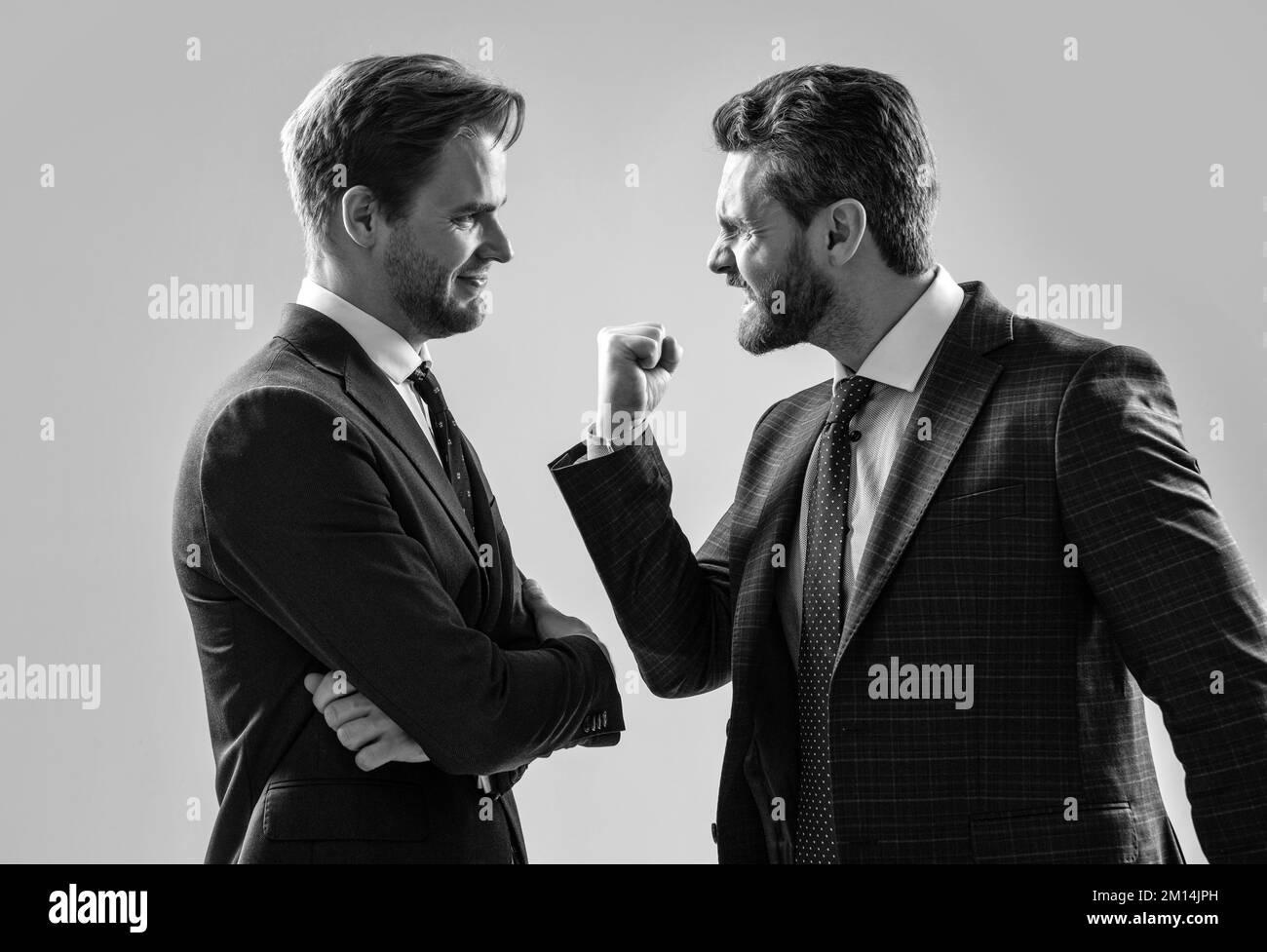 Angry men fist fight Black and White Stock Photos & Images - Alamy