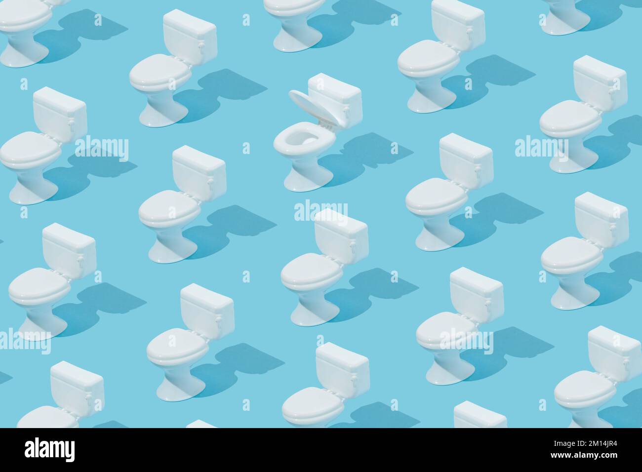 The 3D rendered white toilet bowls pattern on the blue background ...
