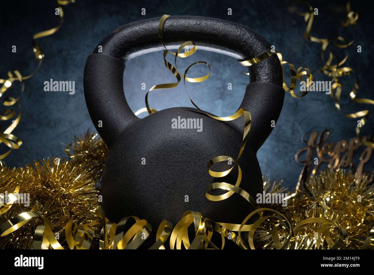 Heavy kettlebell, golden decorations for New Year's Eve celebration ...