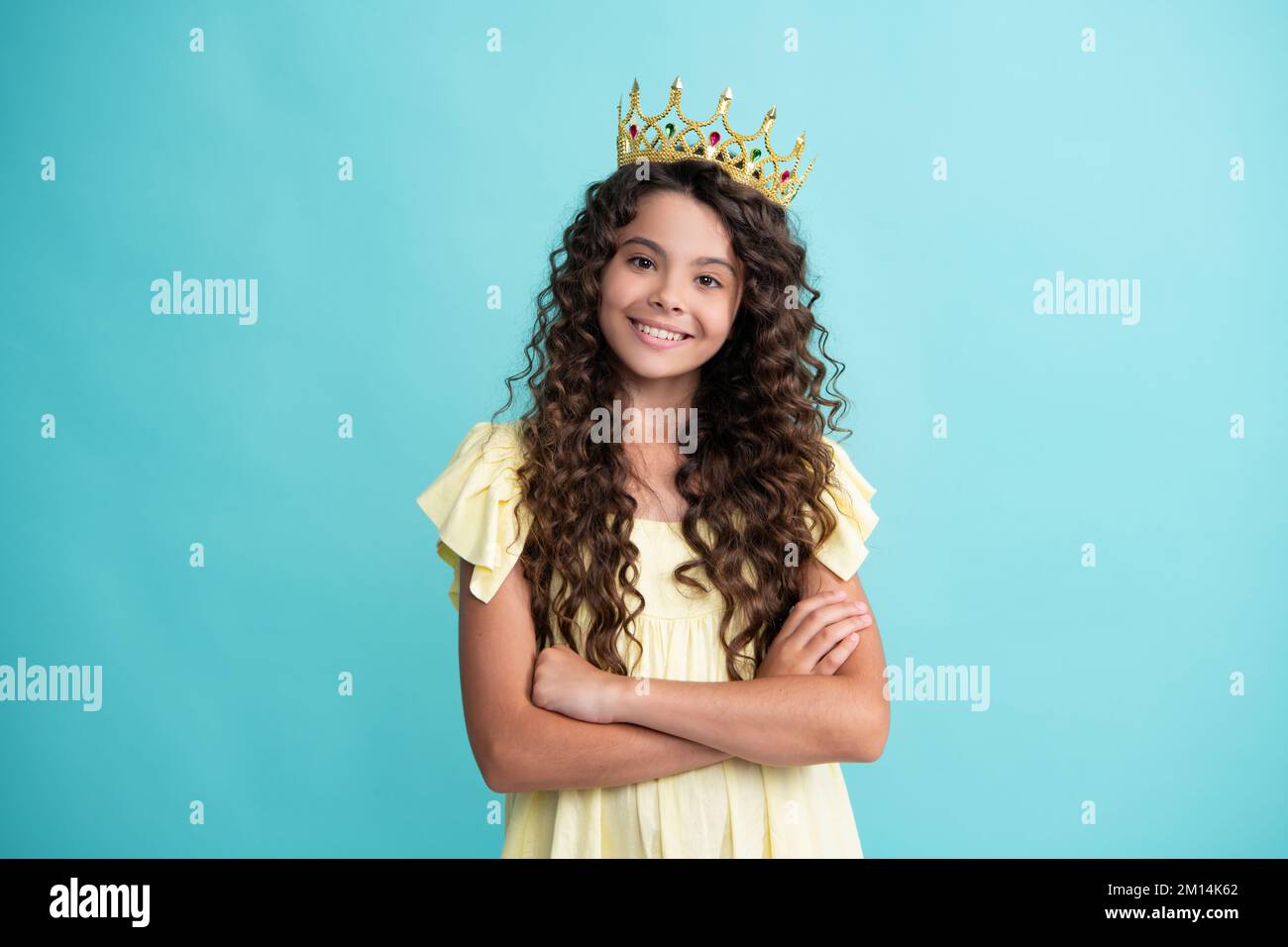 Portrait of ambitious teenage girl with crown, feeling princess ...