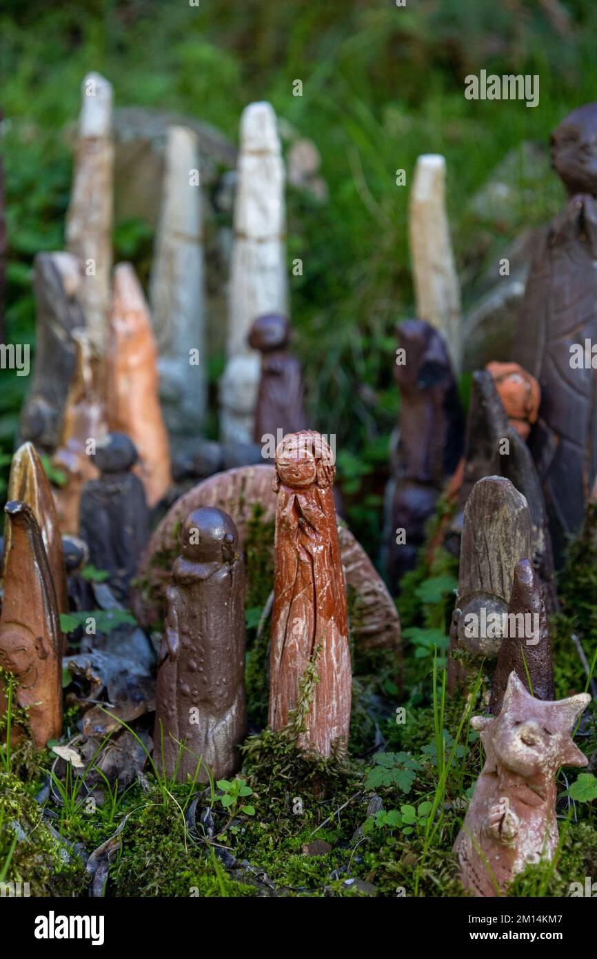 A vertical shot of small clay figures in the Shiststone town of Cadeira ...
