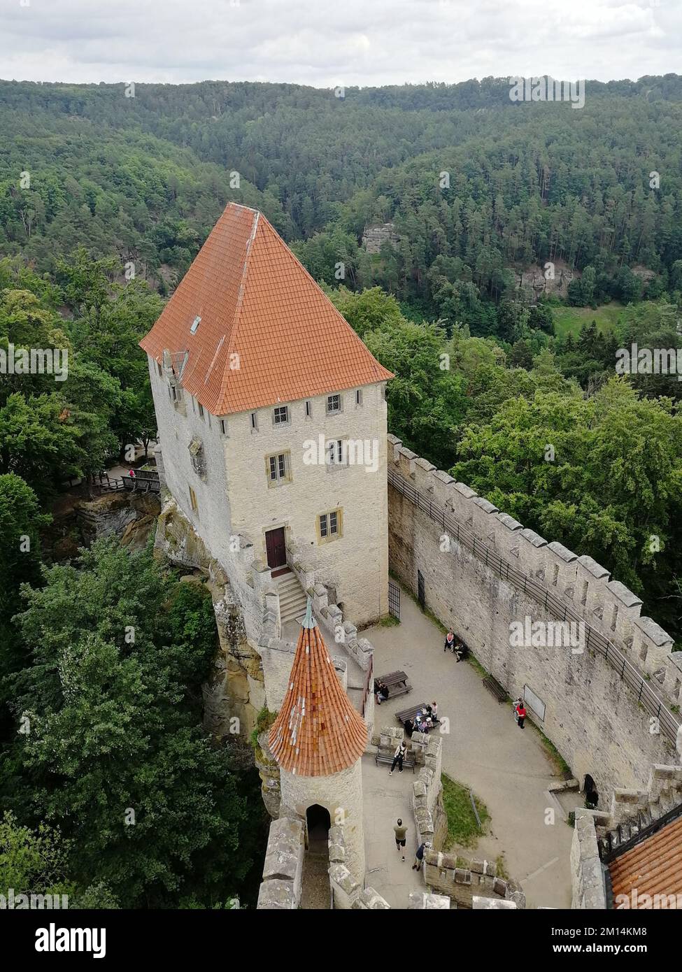 An aerial view of medieval Krivoklat historical gothic castle on a ...