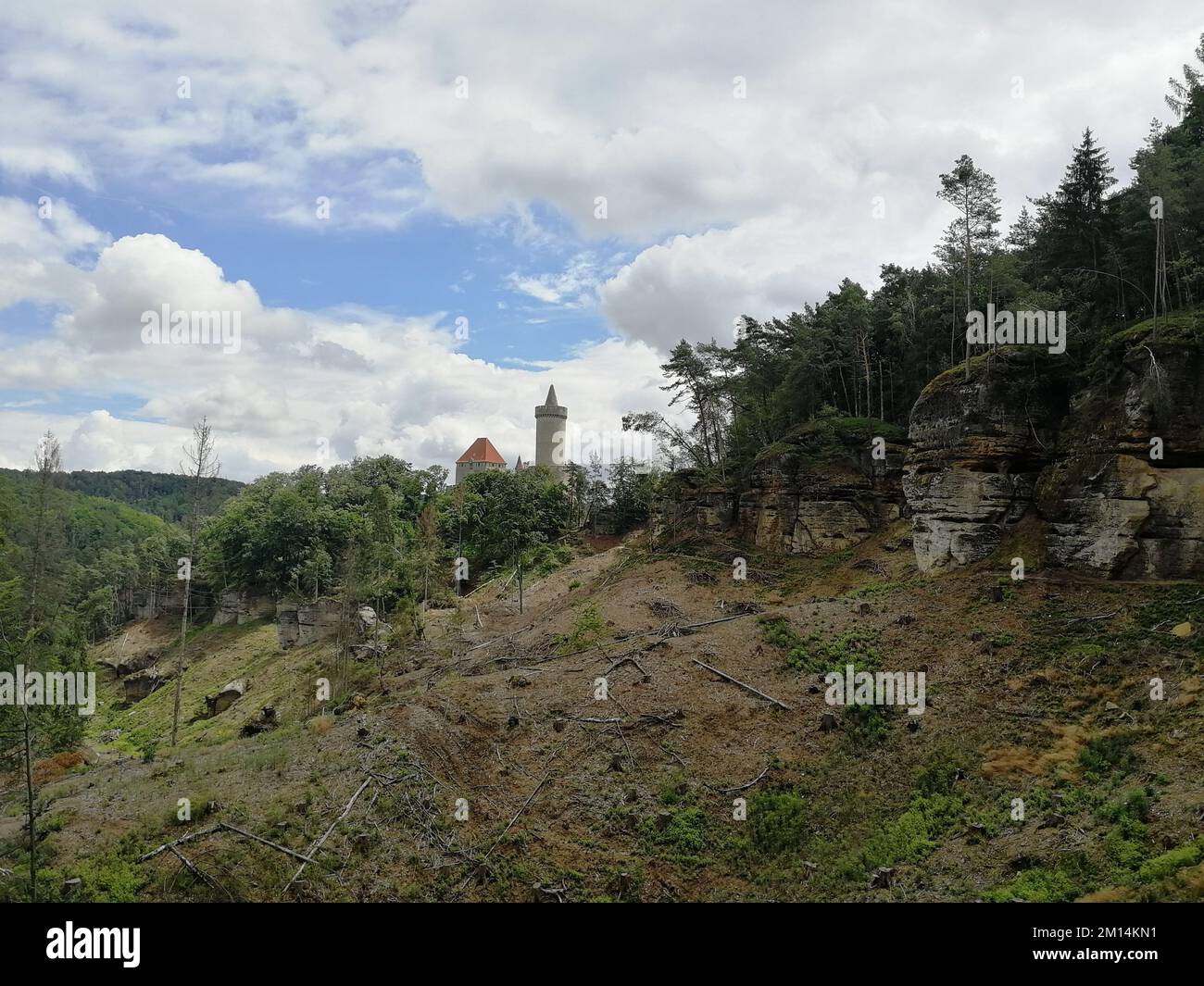 The medieval Krivoklat historical gothic castle on a green hill in ...