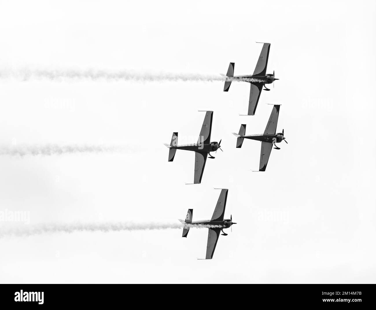 Minimalist picture with an acrobatic aircraft light airplane leaving ...