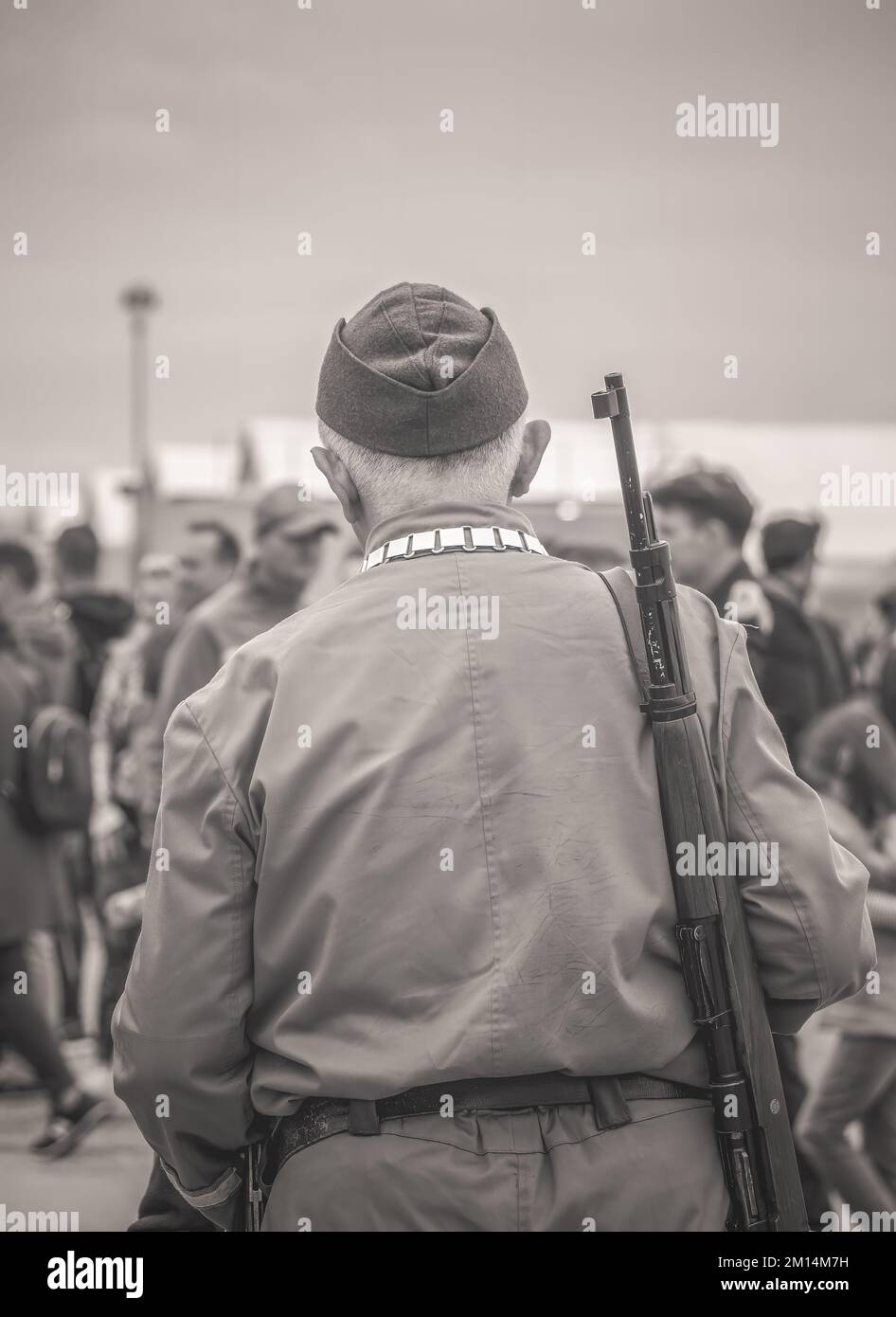 Rear view vintage picture with an senior ma veteran man from world war ...