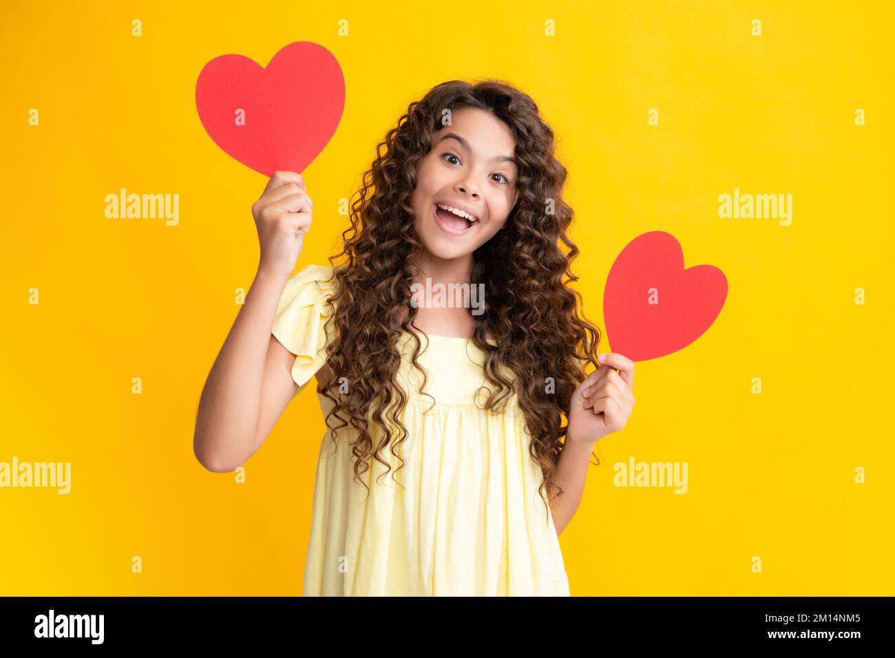 Young teenager child girl with heart shape. Happy Valentines Day. Love ...