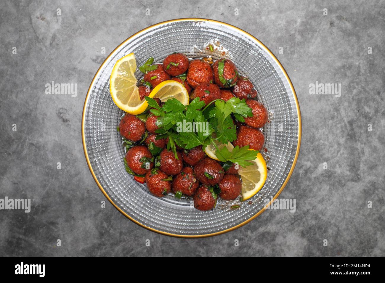 Aleppo meatballs or bulgur meatballs on a dark background. Turkish ...
