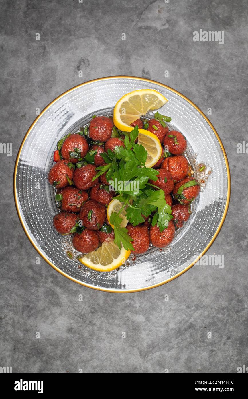 Aleppo meatballs or bulgur meatballs on a dark background. Turkish ...